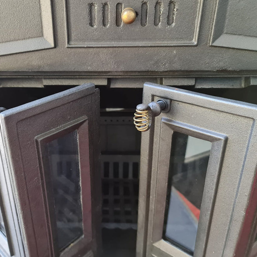 Stufa a legna "Franklin" 13 kW in ghisa con inserti ottone caminetto h